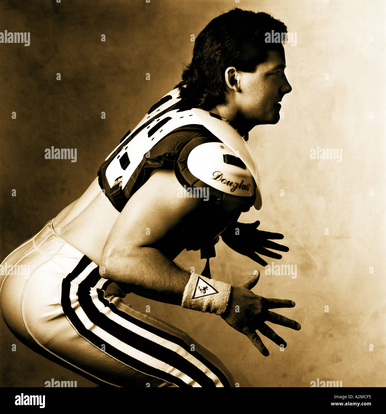 portrait of a college football player Stock Photo - Alamy
