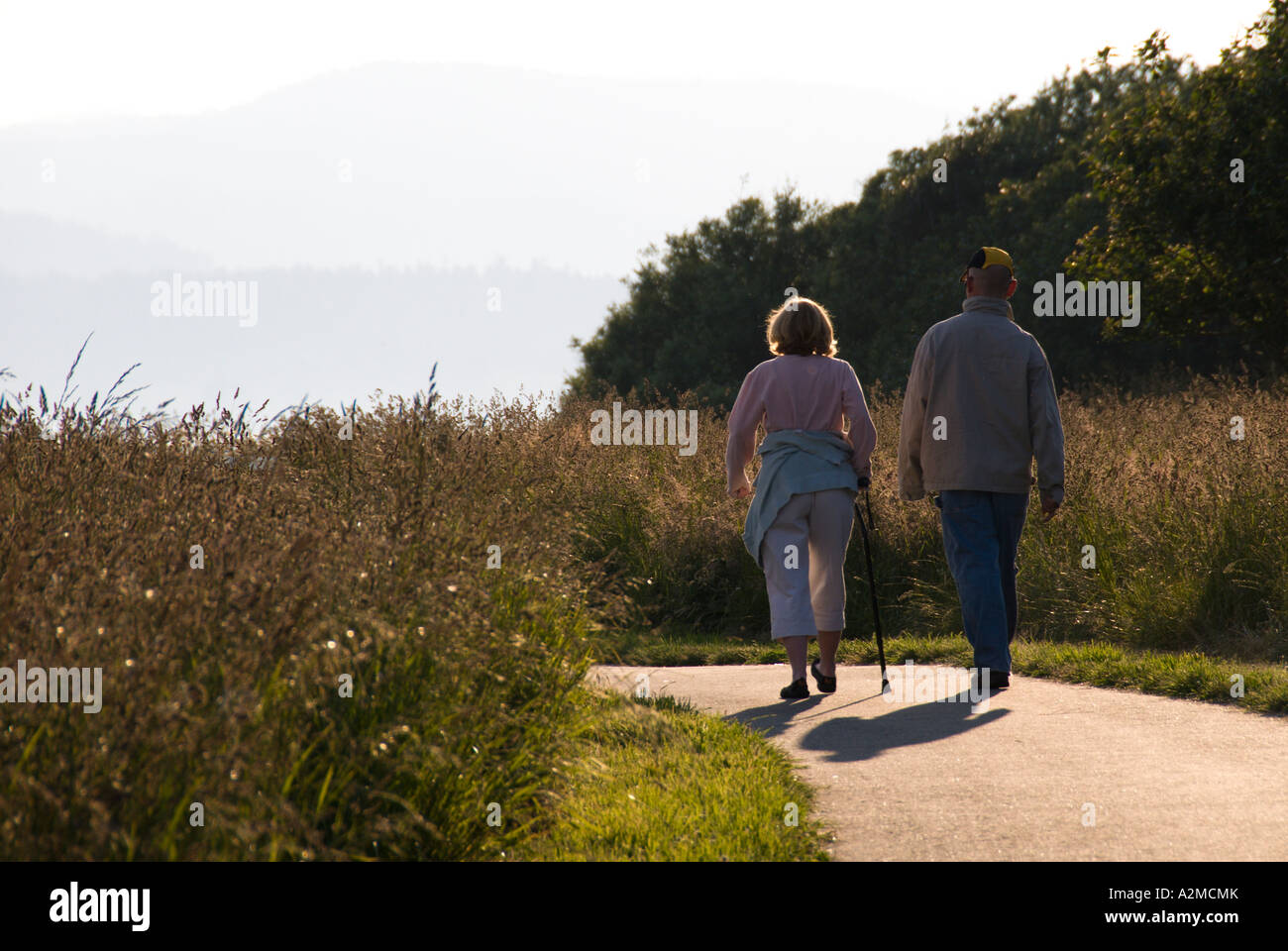 A couple out for an evening stroll Stock Photo - Alamy