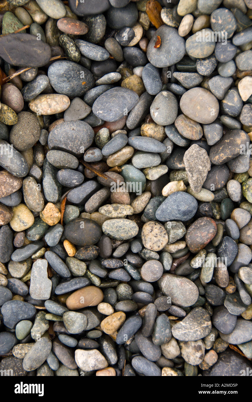 Small stones on a beach Stock Photo - Alamy