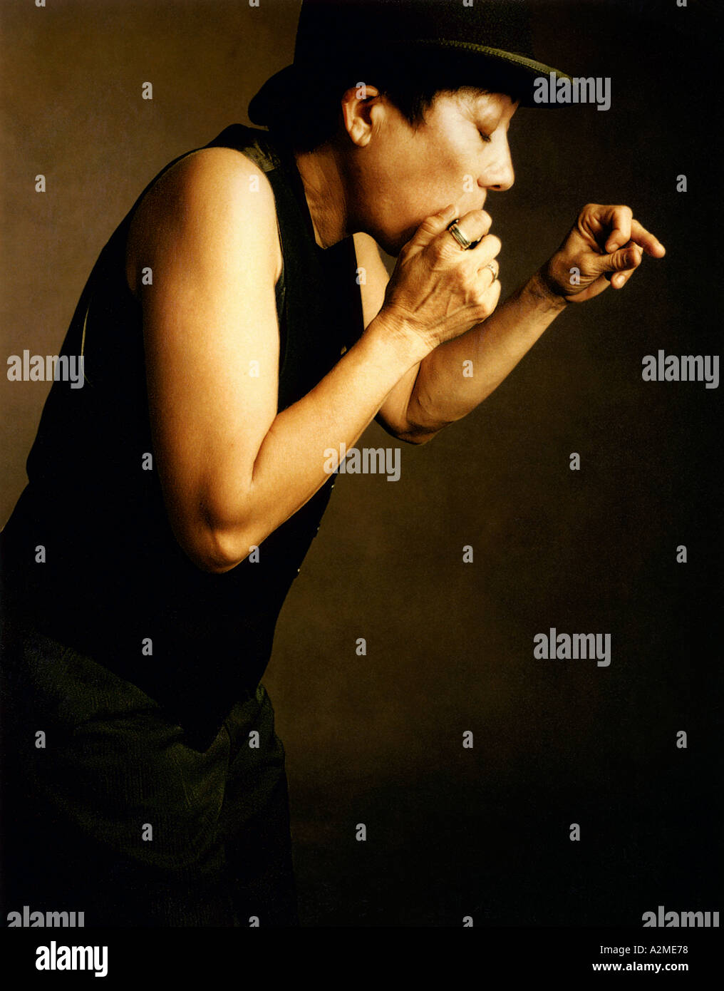 Female harmonica player hi-res stock photography and images - Alamy