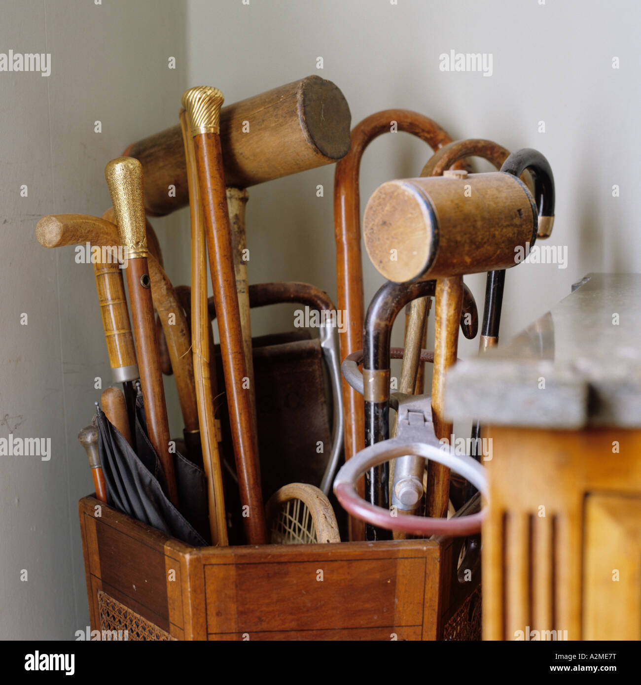 Collection of old fashioned walking and croquet sticks in an umbrella ...
