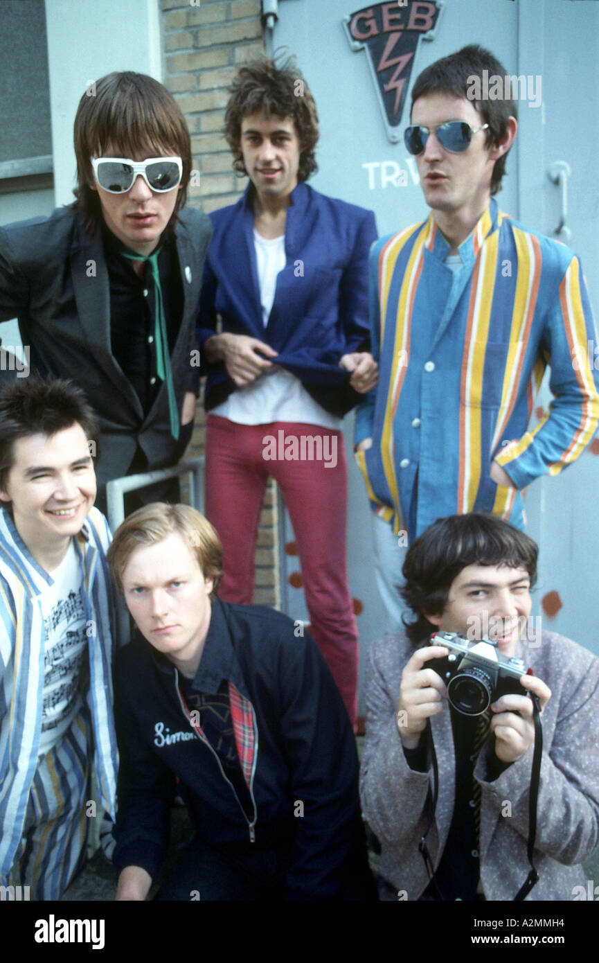 BOOMTOWN RATS UK rock group about 1984 with Bob Geldof in red trousers ...