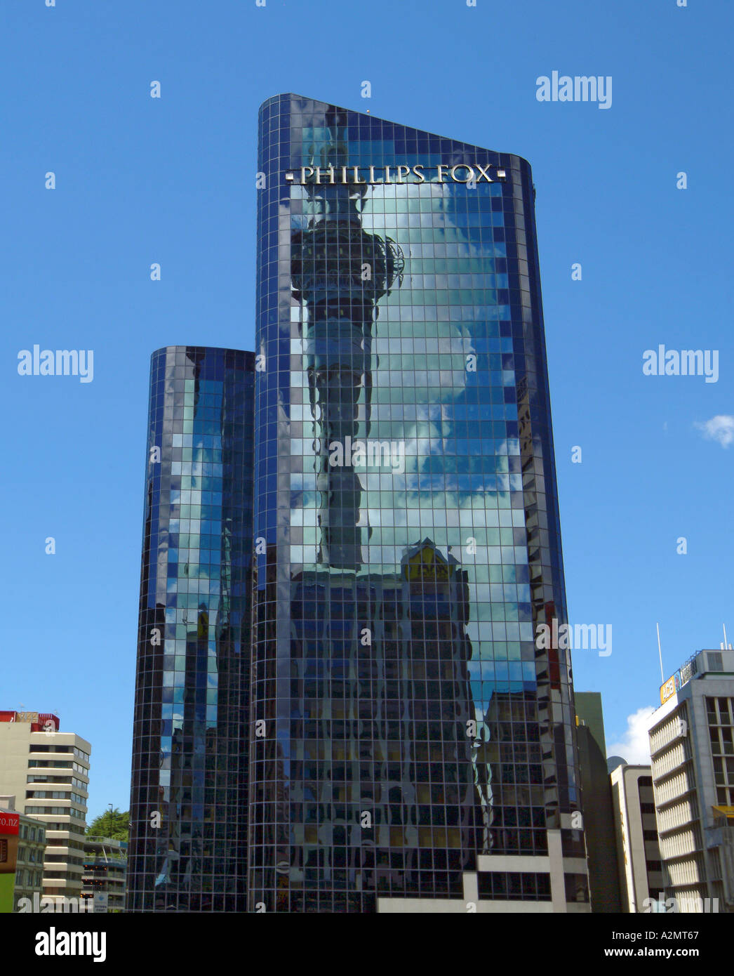Reflection of the Auckland Sky City sky tower in the Phillips Fox ...