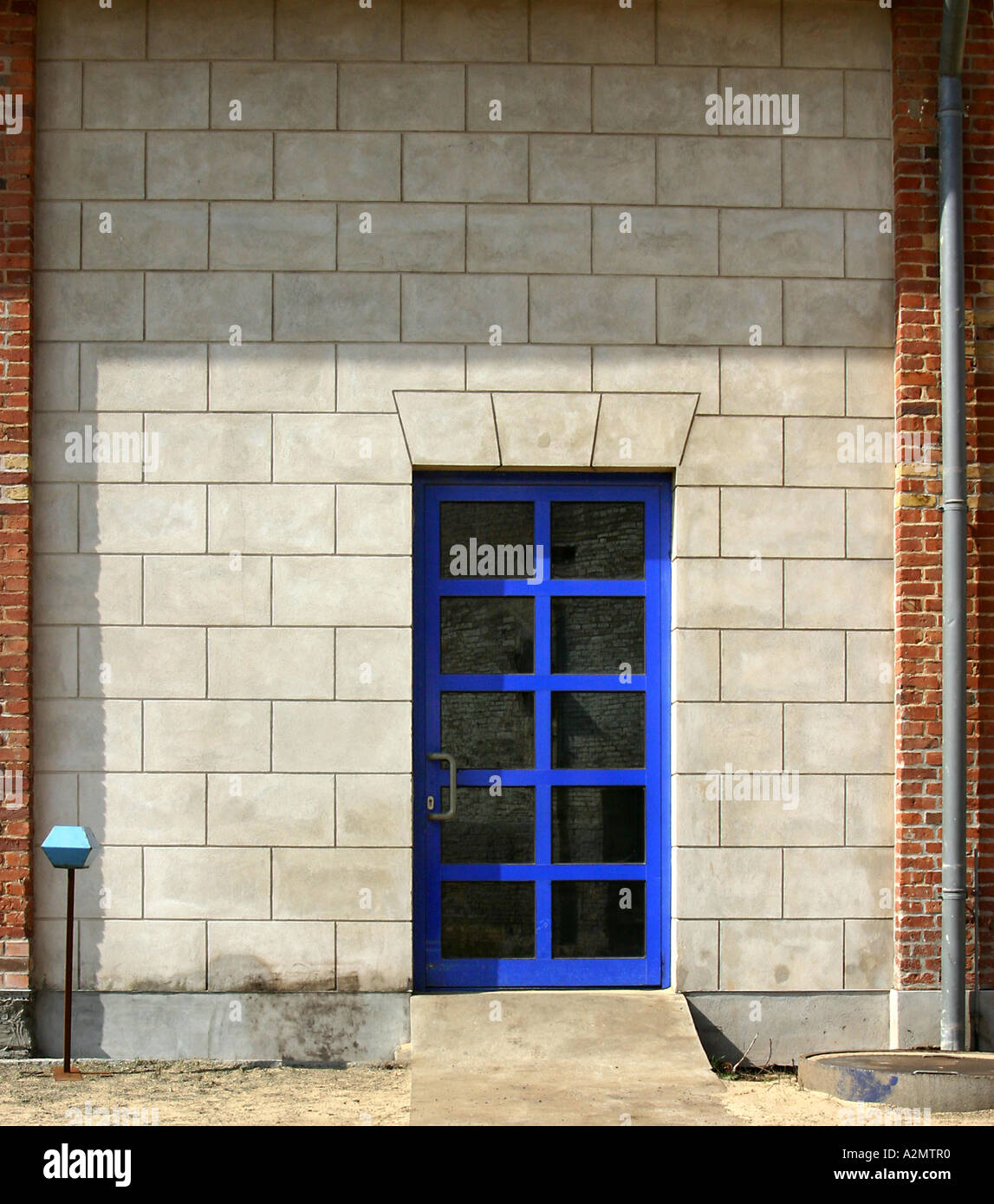 blue door on a new building Stock Photo - Alamy