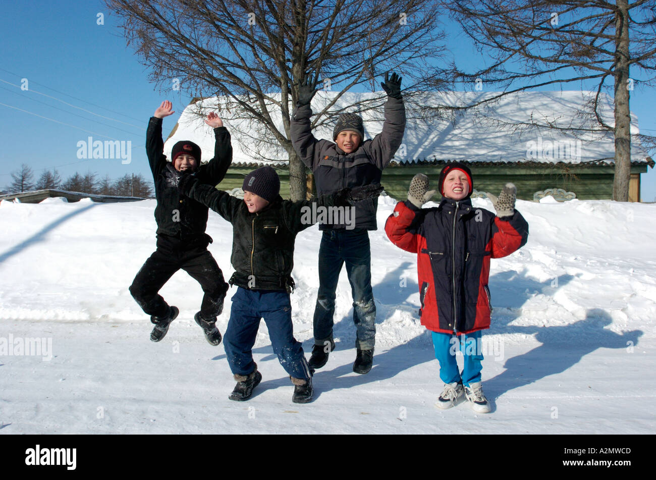 A group of young boys showing off jumping in Nogliki Sakhalin Island ...