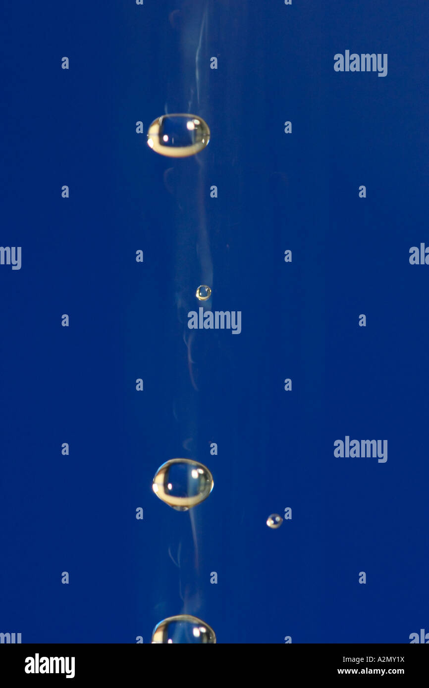Water drops falling from tap Stock Photo - Alamy