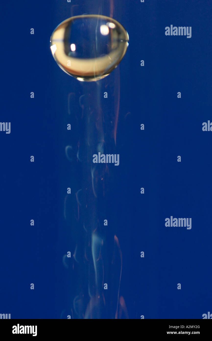 Water drops falling from tap Stock Photo - Alamy