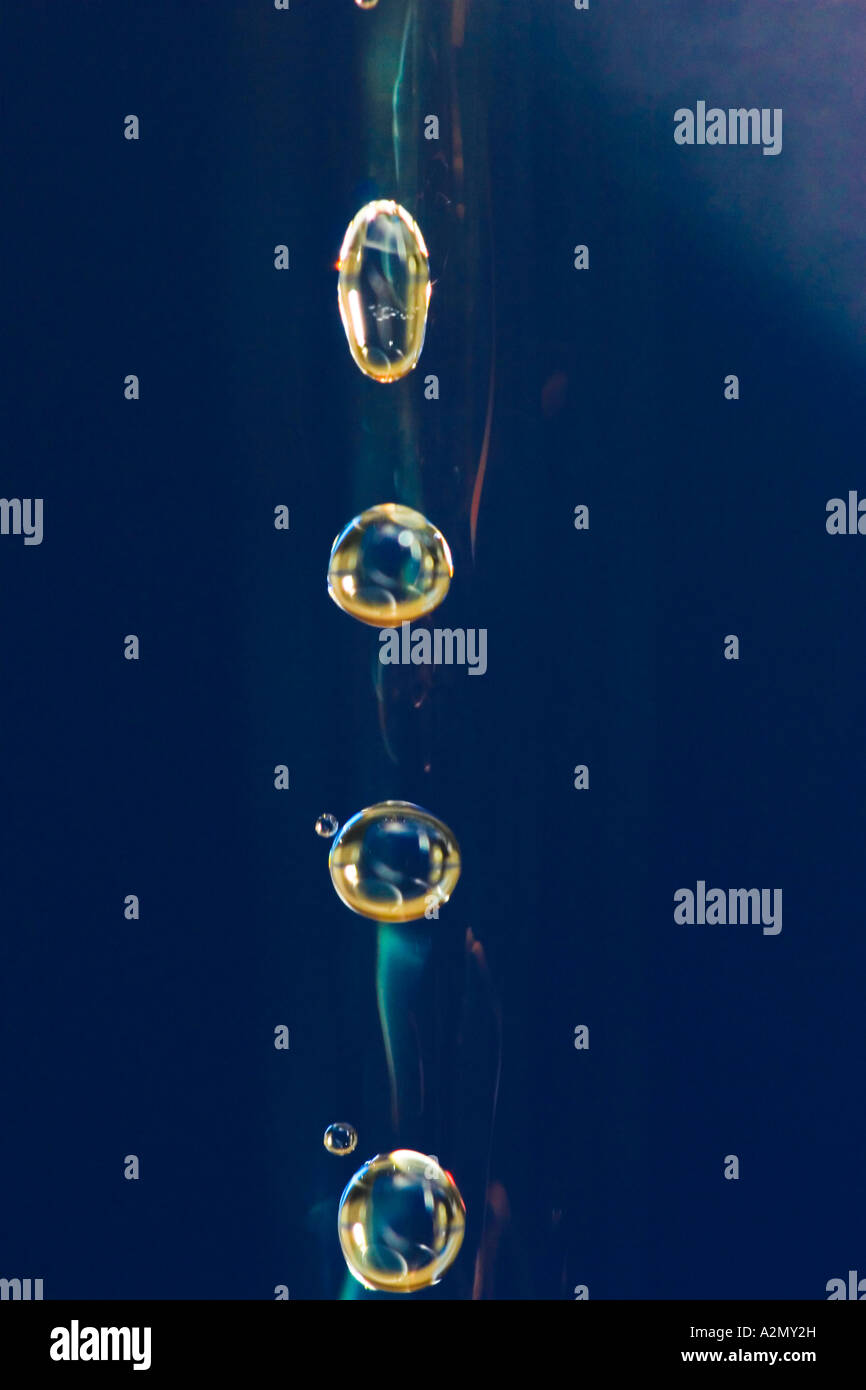 Water drops falling from tap Stock Photo - Alamy