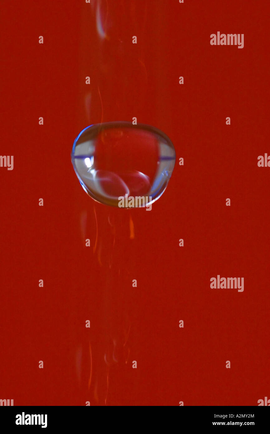 Water drops falling from tap Stock Photo - Alamy