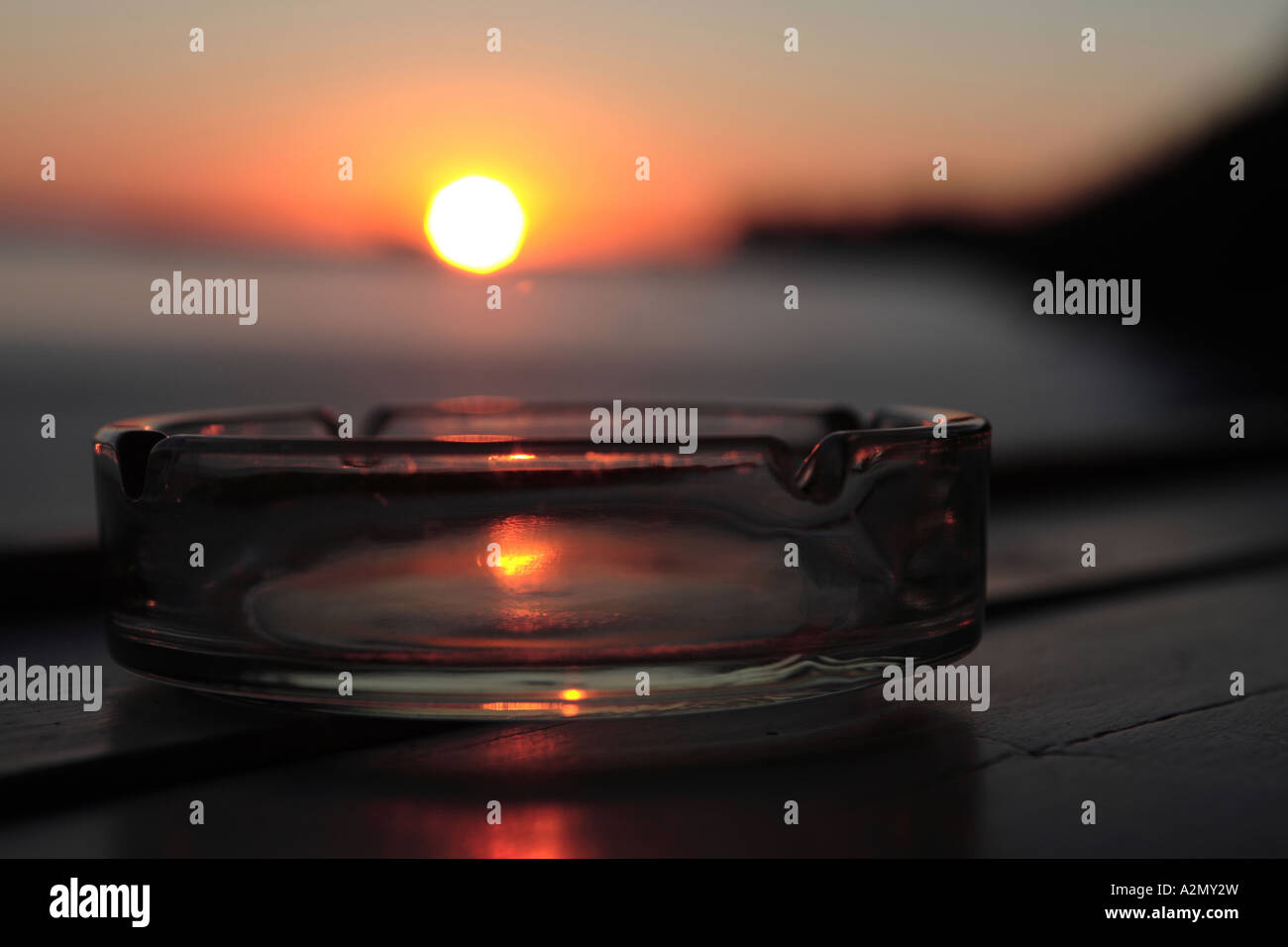 sun setting on smokers Stock Photo - Alamy