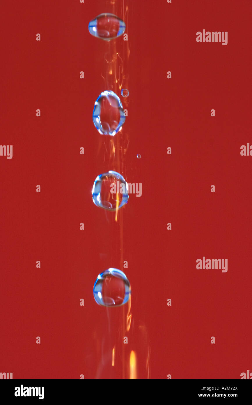 Water drops falling from tap Stock Photo - Alamy
