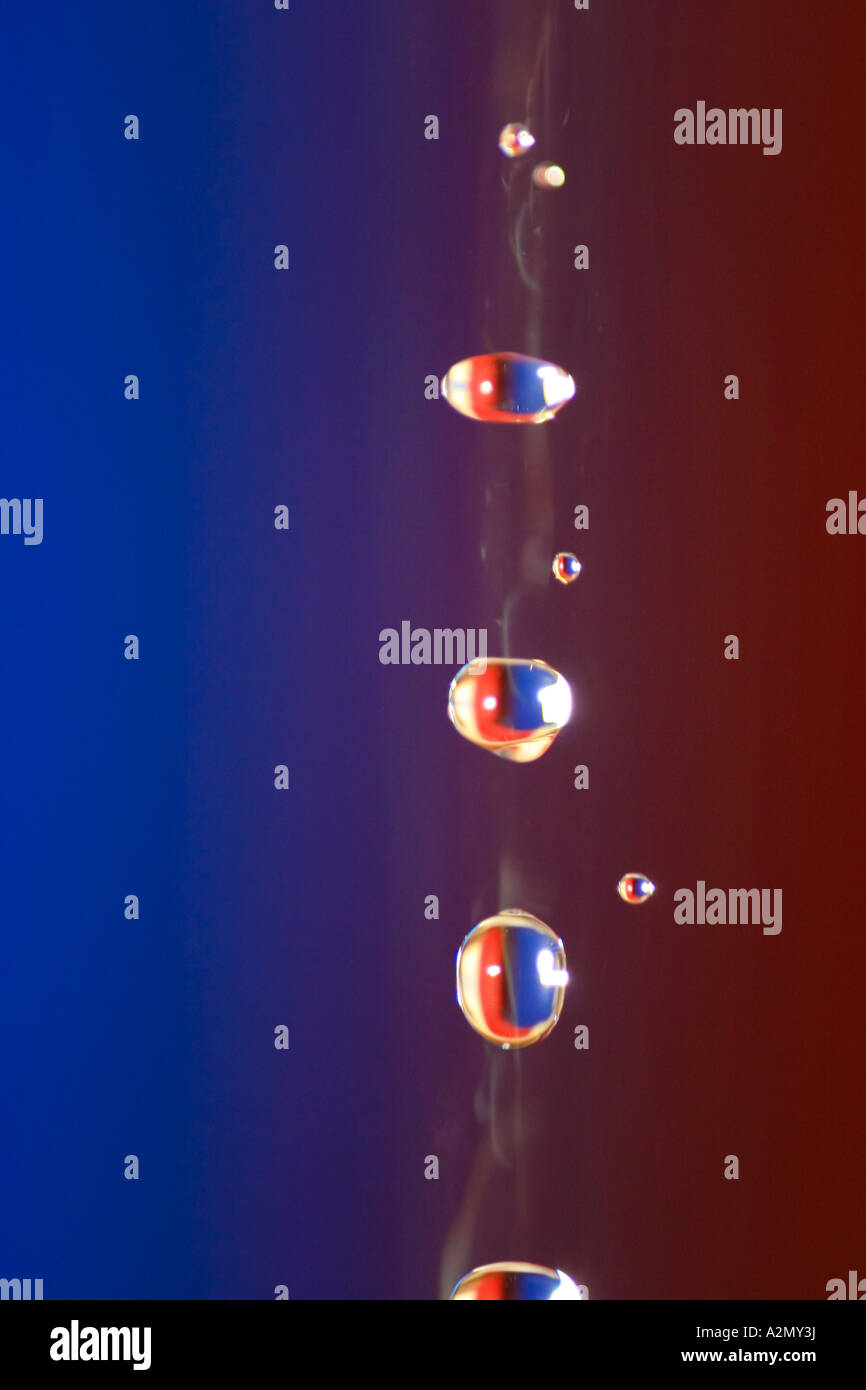 Water drops falling from tap Stock Photo - Alamy