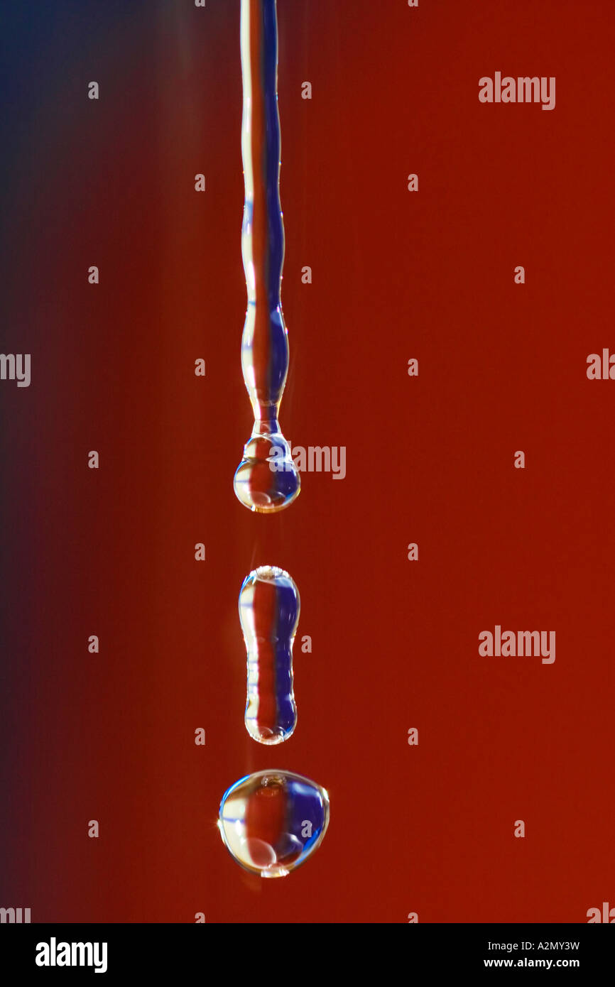 Water drops falling from tap Stock Photo - Alamy