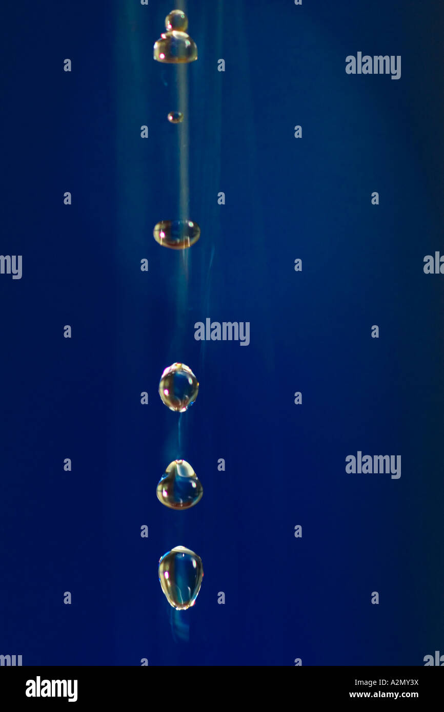 Water drops falling from tap Stock Photo - Alamy