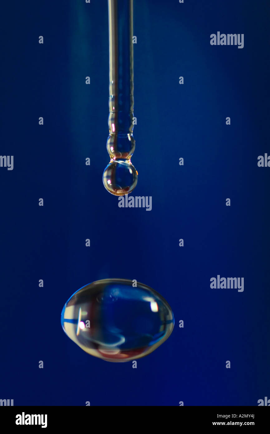 Water drops falling from tap Stock Photo - Alamy