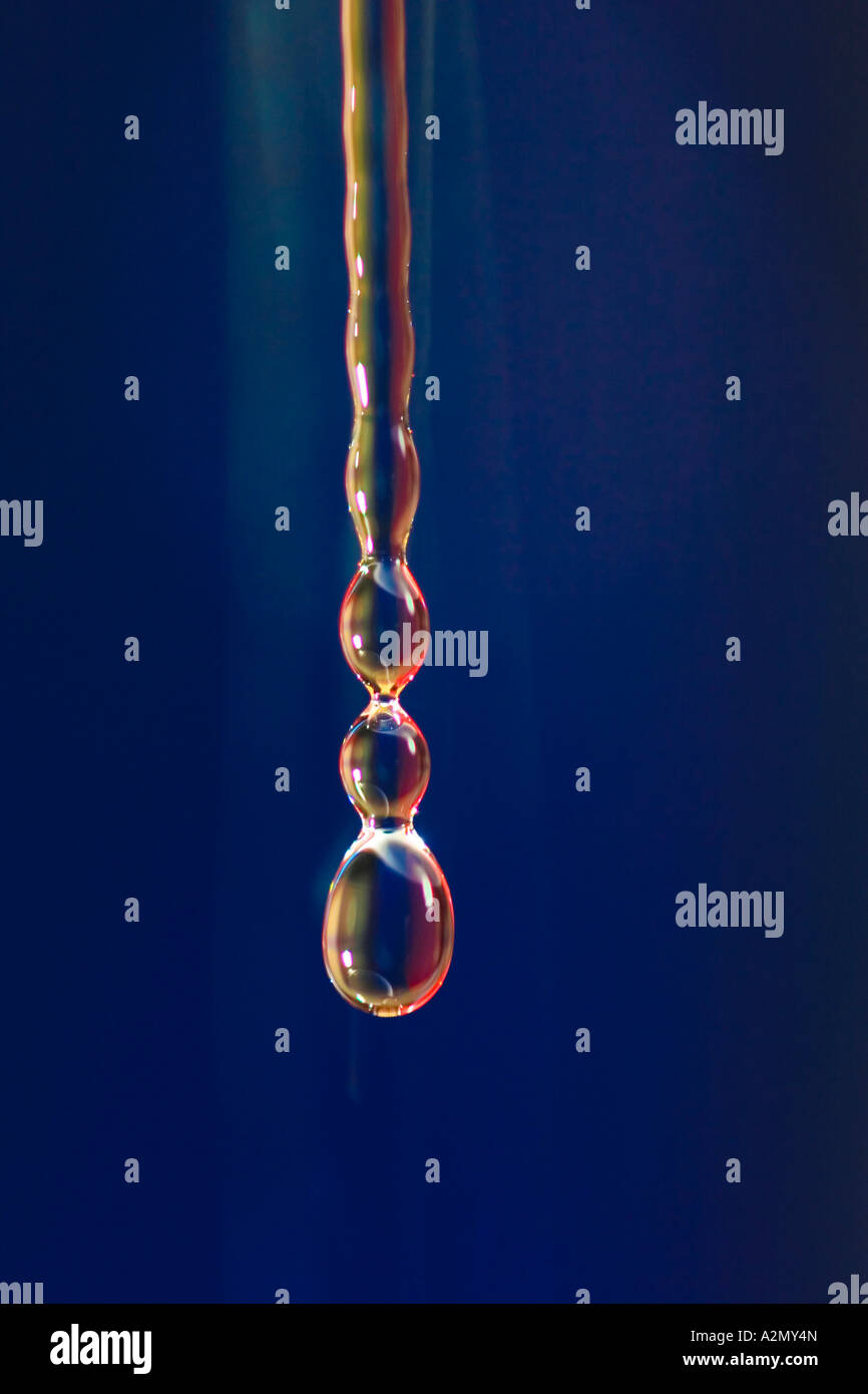 Water drops falling from tap Stock Photo - Alamy