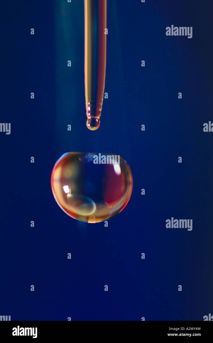 Water drops falling from tap Stock Photo - Alamy