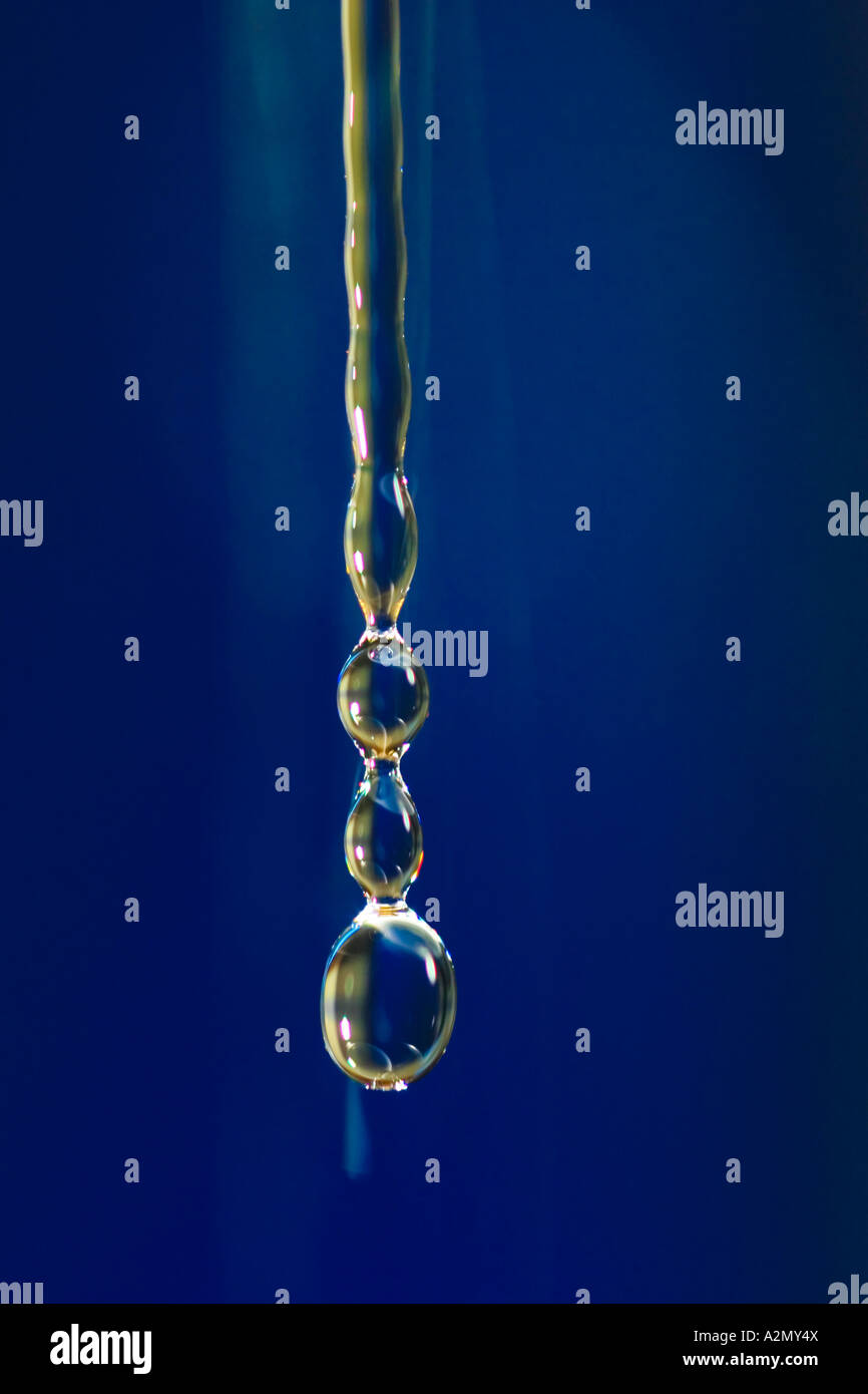 Water drops falling from tap Stock Photo - Alamy
