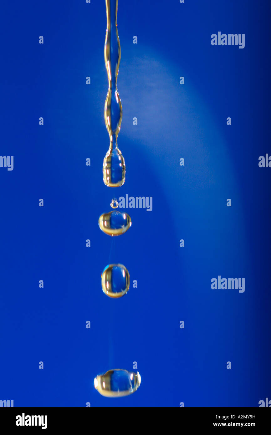 Water drops falling from tap Stock Photo - Alamy