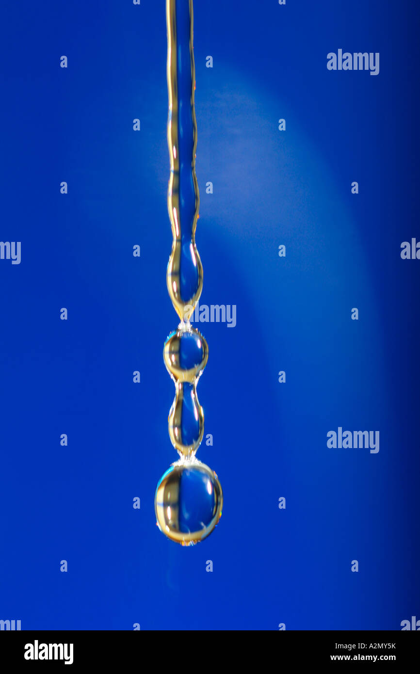 Water drops falling from tap Stock Photo - Alamy