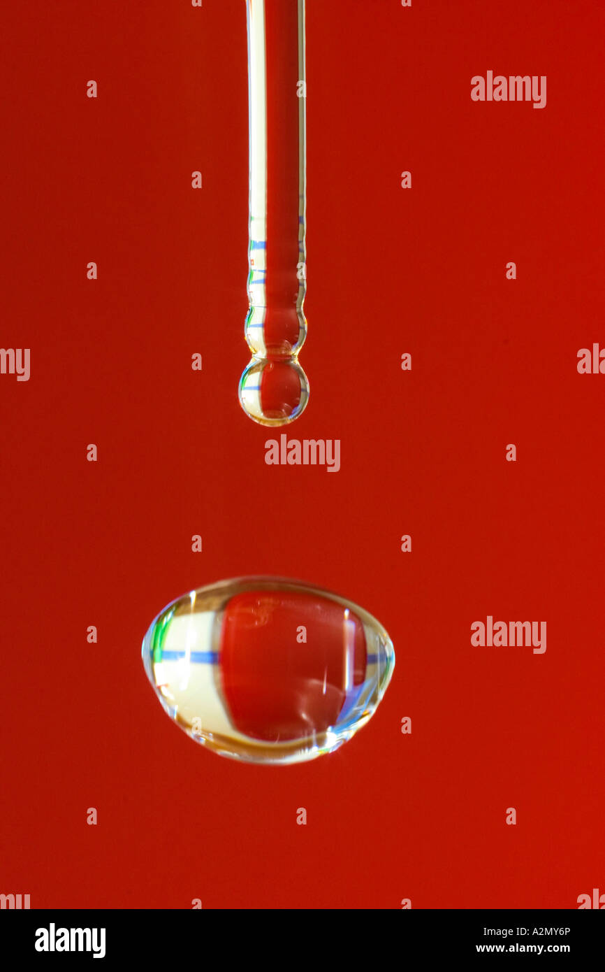 Water drops falling from tap Stock Photo - Alamy