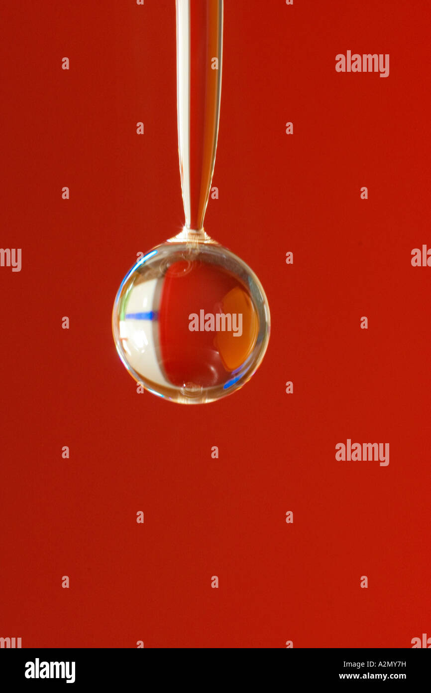 Water drops falling from tap Stock Photo - Alamy