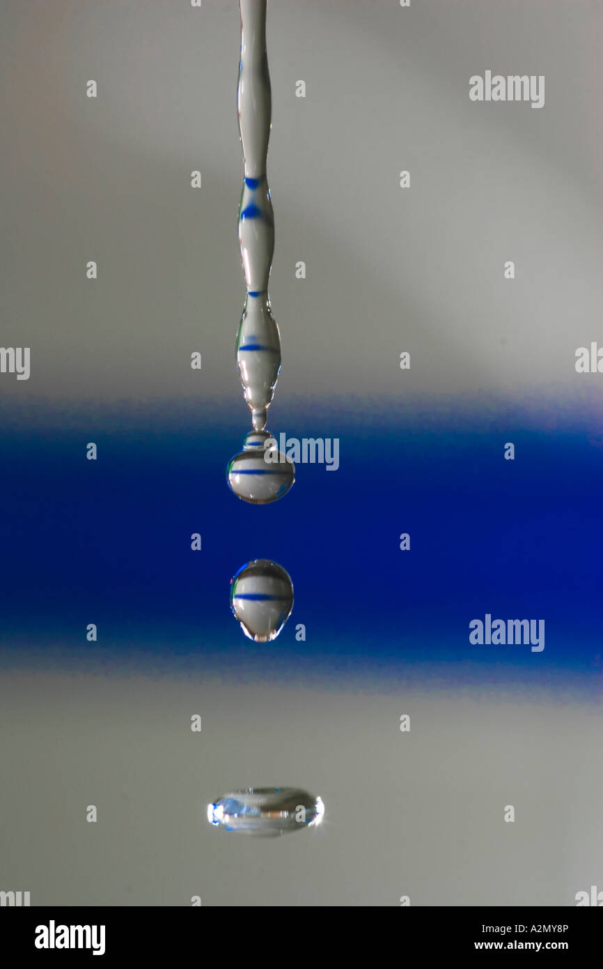 Water drops falling from tap Stock Photo - Alamy
