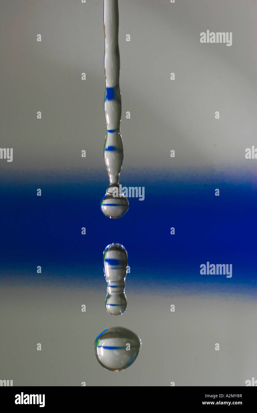Water drops falling from tap Stock Photo - Alamy