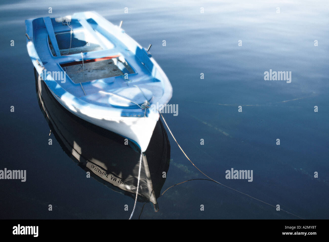 ethereal image of lone rowing boat Stock Photo - Alamy