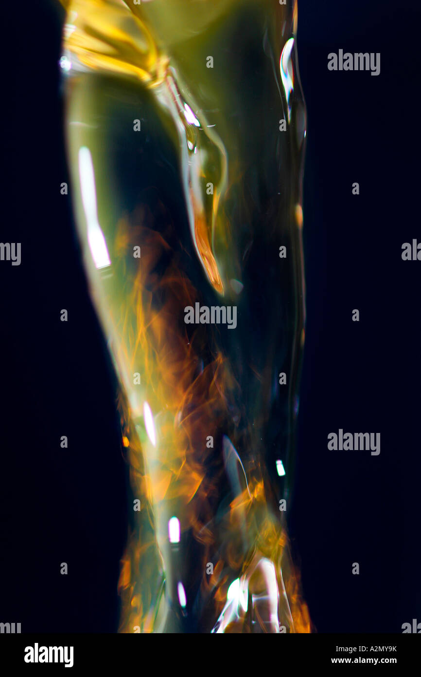 Water column and drops falling from tap Stock Photo - Alamy