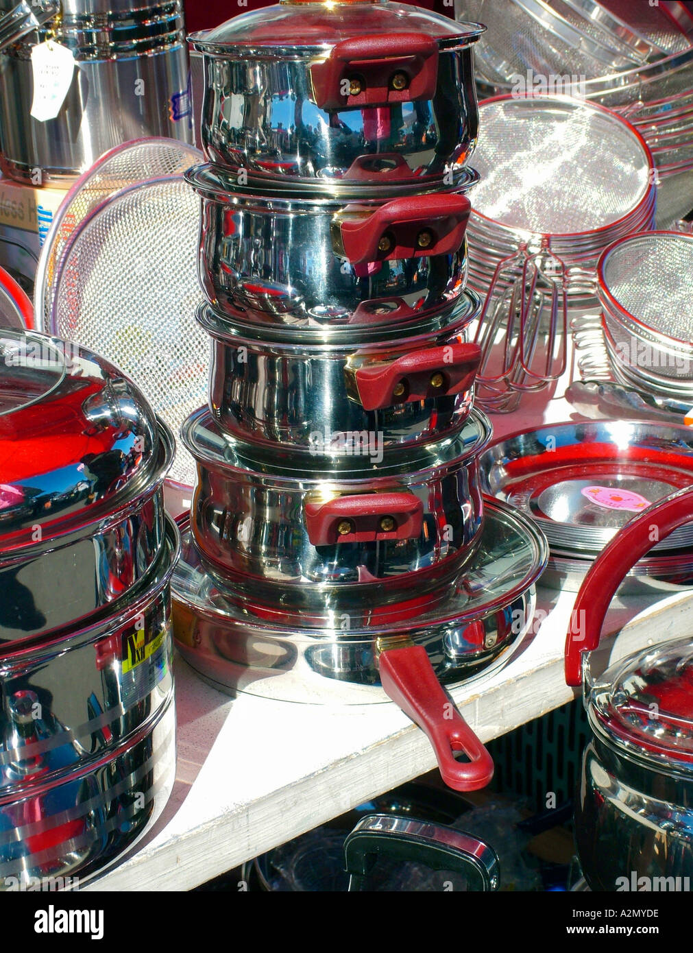 Aluminium saucepans pots and pans Stock Photo - Alamy