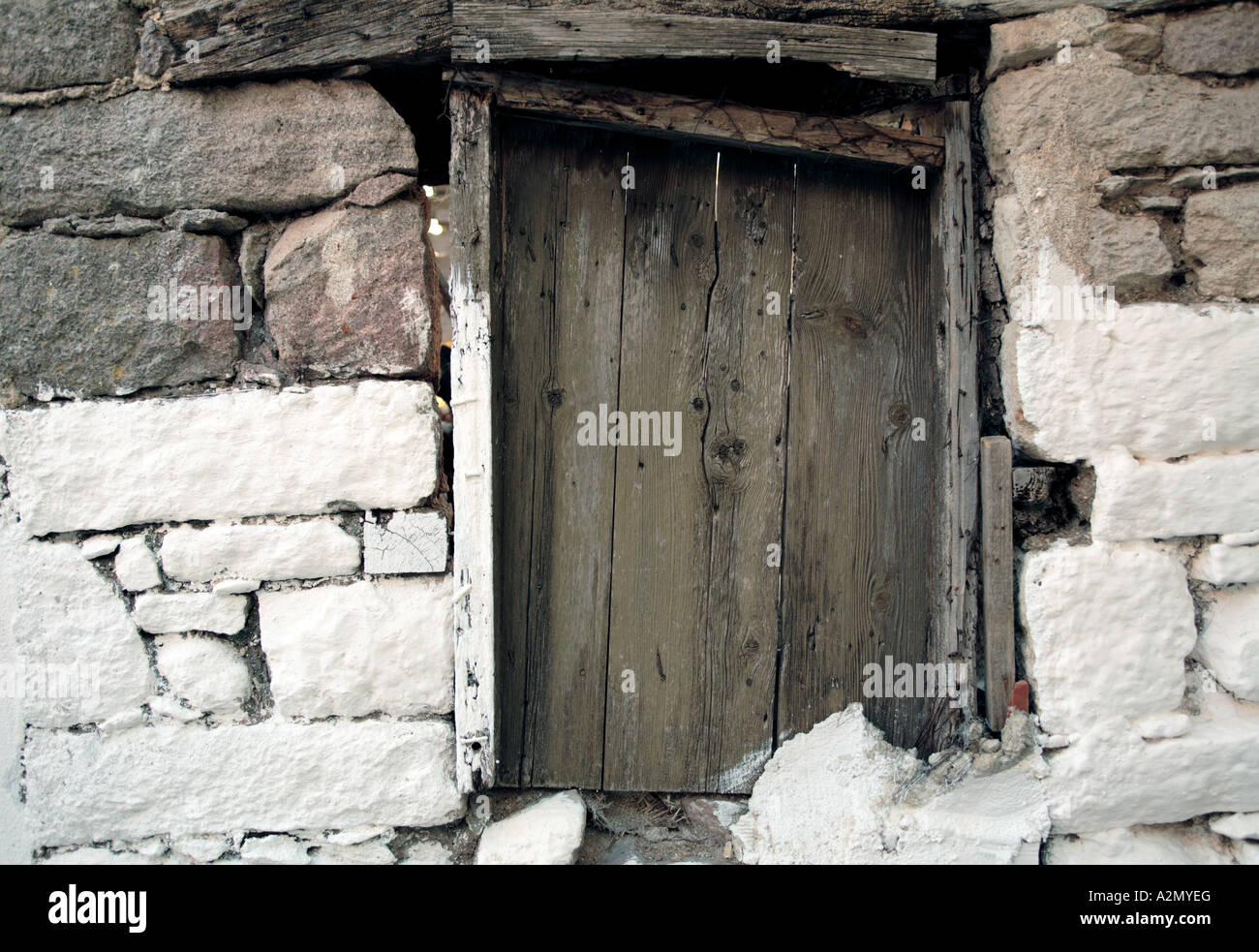 derelict window shutter and wall Stock Photo - Alamy