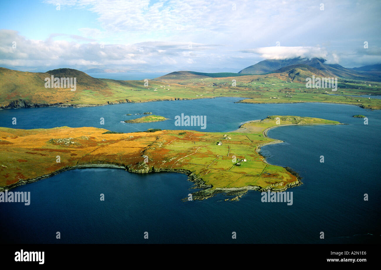 Aerial view east over Beginish Island toward village of Cahirsiveen on ...
