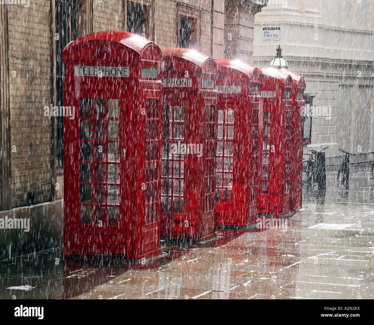 London red phone boxes in the rain Stock Photo - Alamy