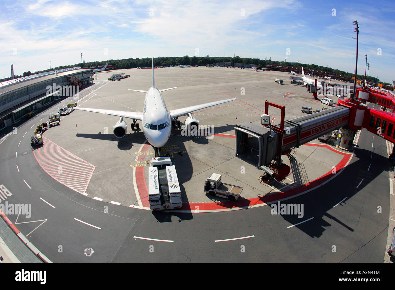 High angle view of airplane on runway at airport, Tegel International ...