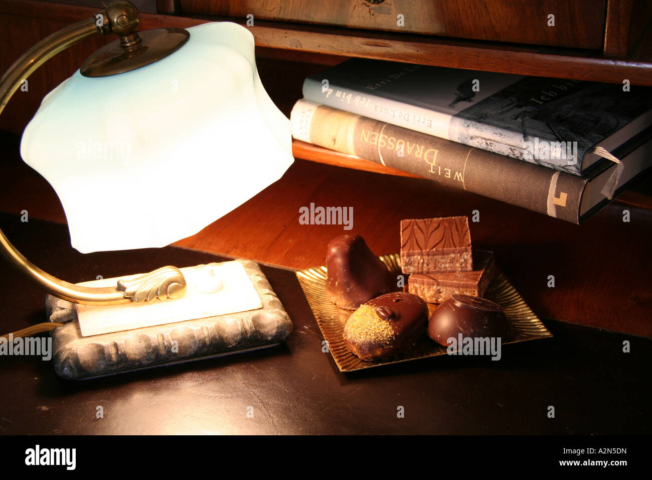 Pastries and cookies under light of lamp Stock Photo - Alamy