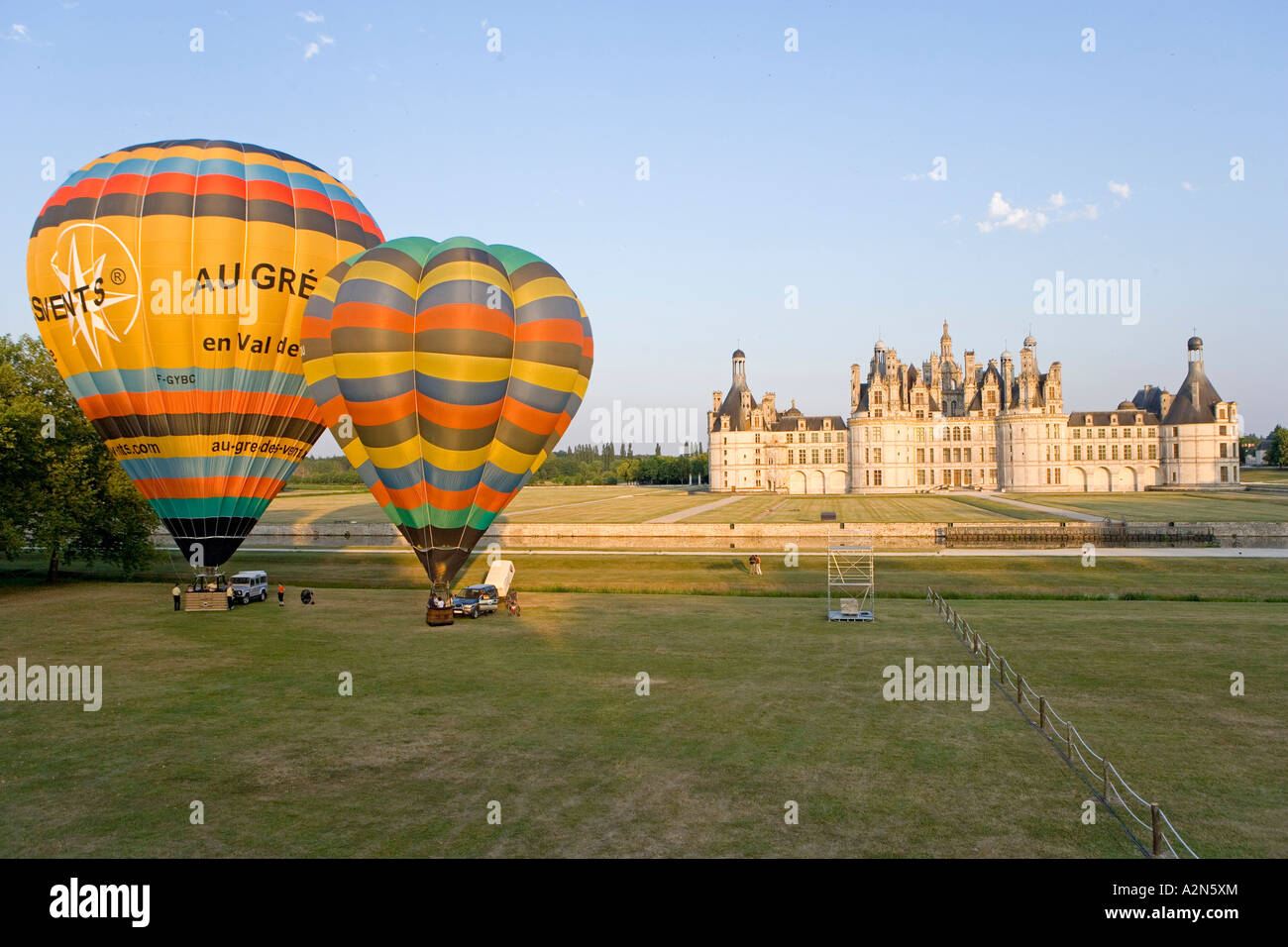 Hot air balloons in front of castle Chateau De Chambord Loir-Et-Cher ...