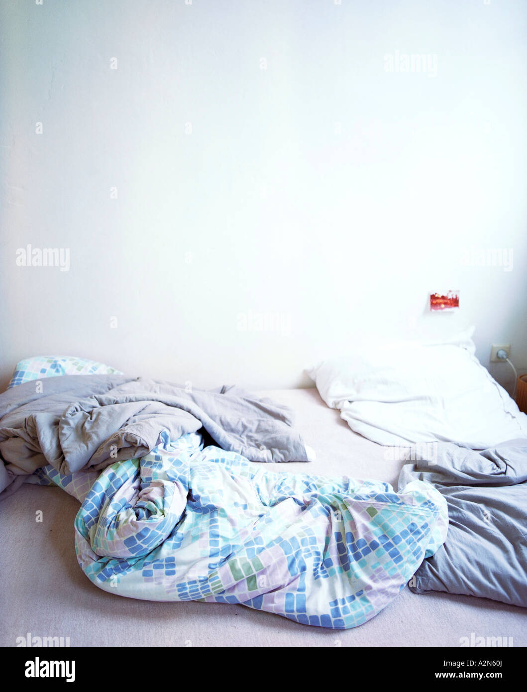 Crumbled sheets on bed Stock Photo - Alamy