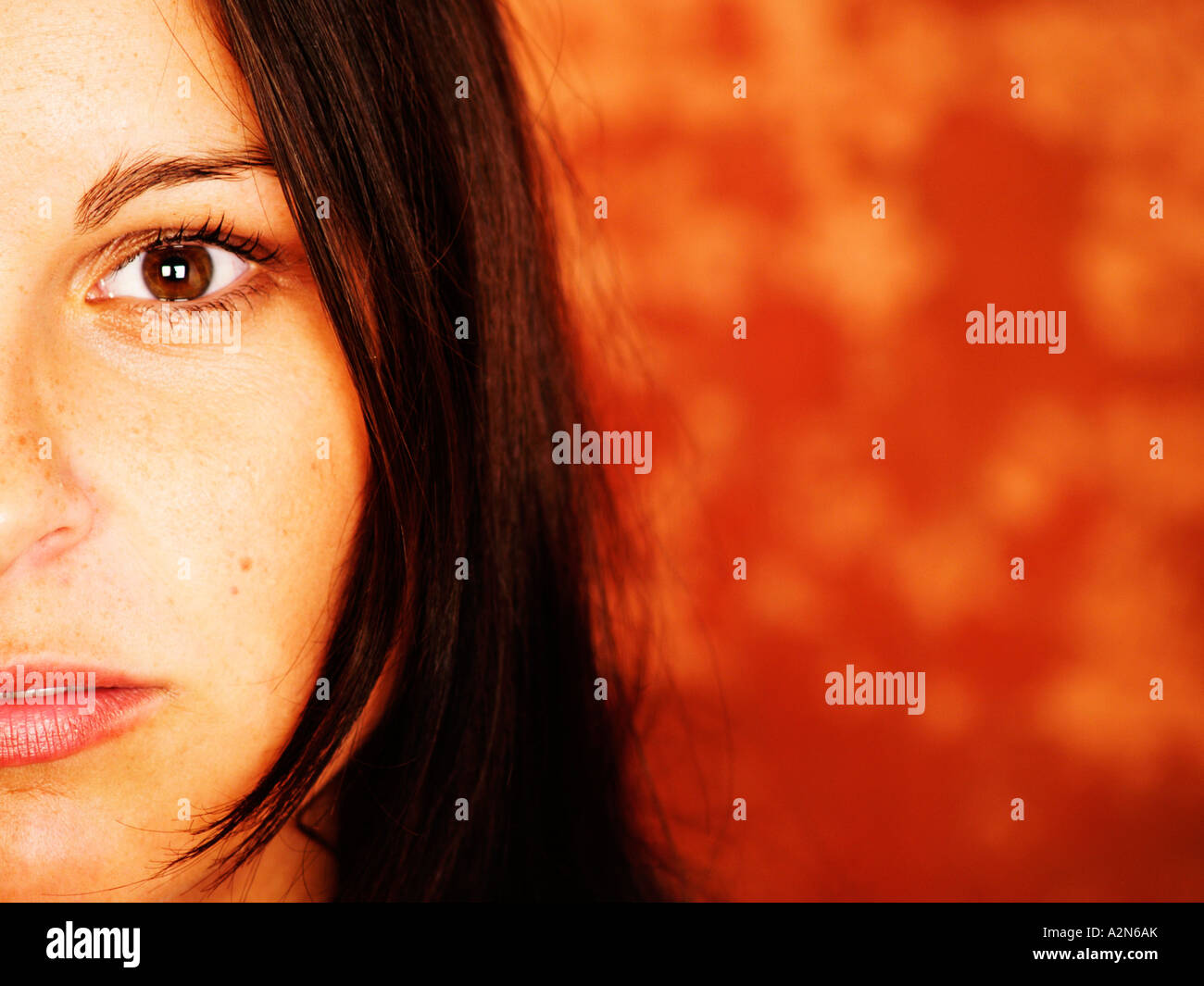Portrait of young woman looking serious Stock Photo - Alamy