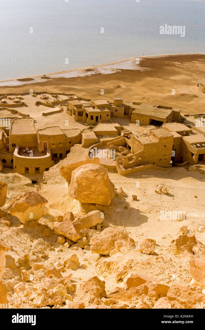 High angle view of old ruins of resort at waterfront, Adrere Amellal ...