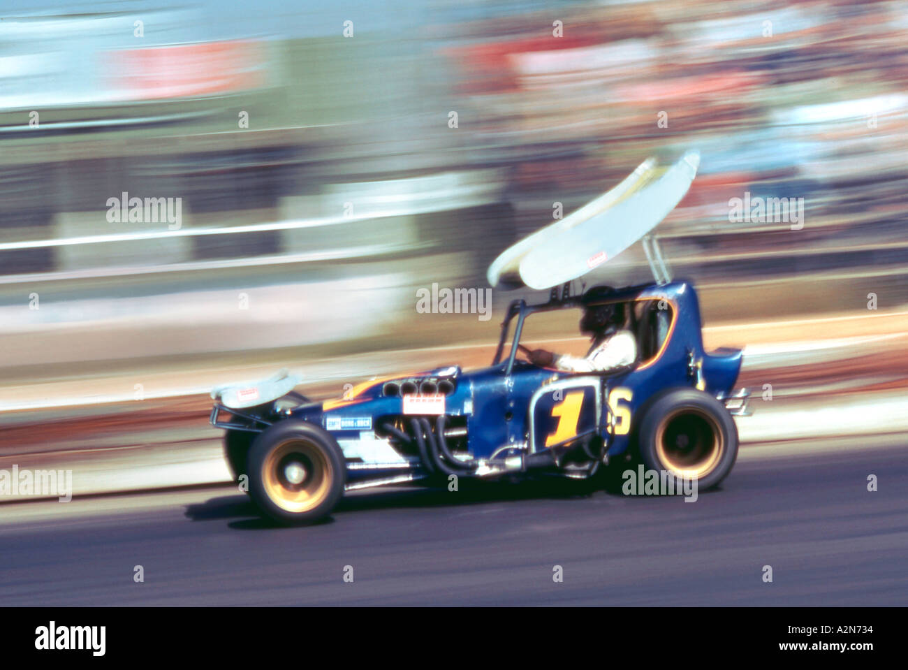 Blurred race car Stock Photo - Alamy