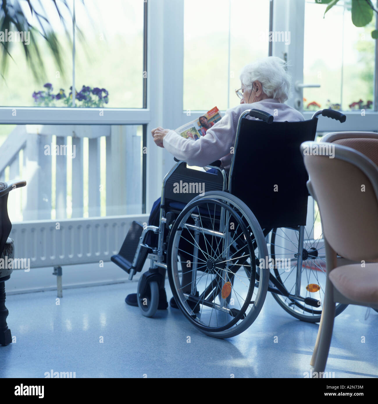 Old woman in wheelchair hi-res stock photography and images - Alamy