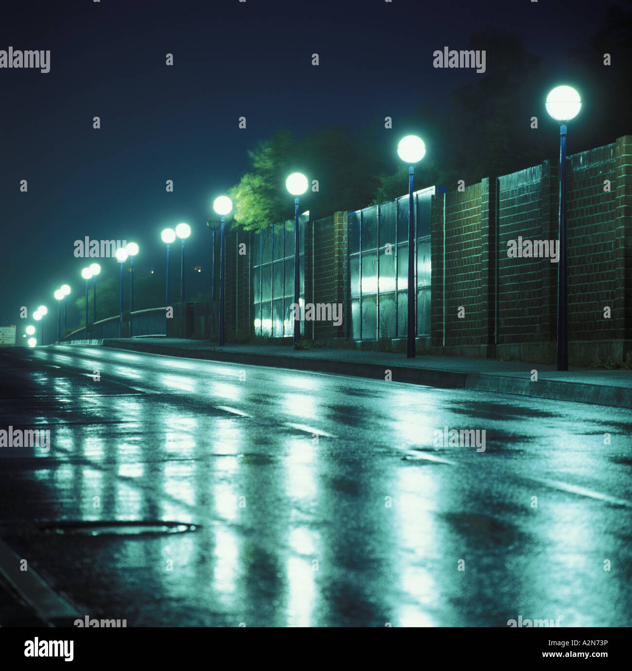 Lanterns lit up at night along road Stock Photo - Alamy