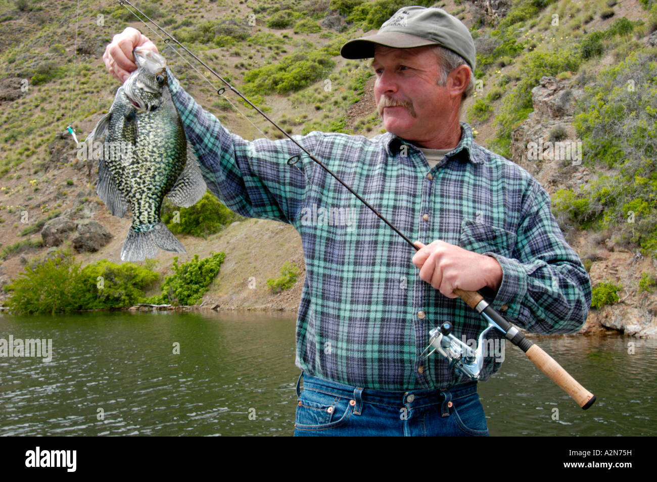 Guide Gary Gorbet with a large Crappie Stock Photo - Alamy