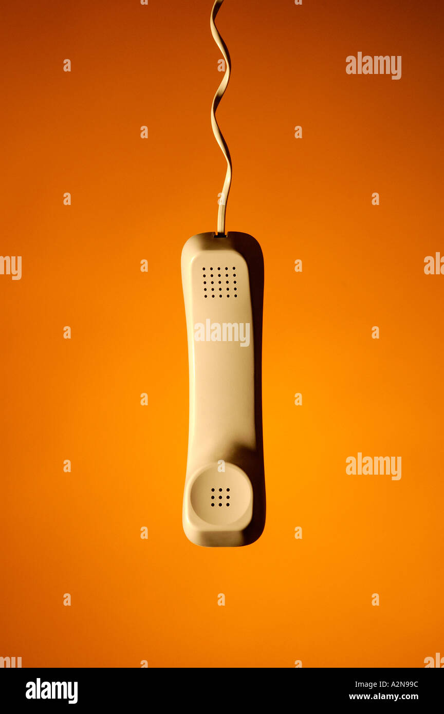 TELEPHONE HANDSET HANGING Stock Photo - Alamy
