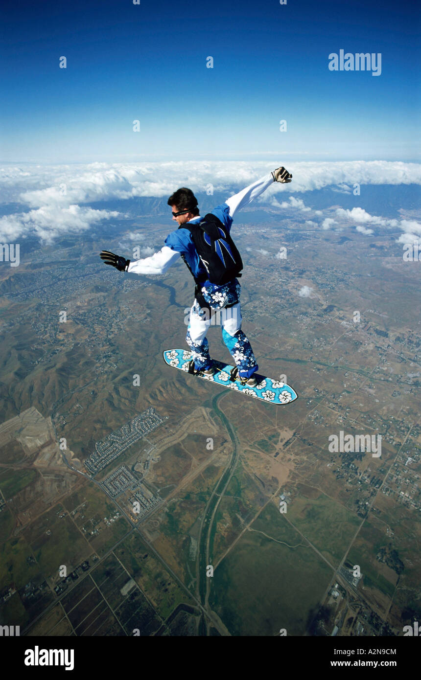 Skydiver falling towards ground Stock Photo - Alamy