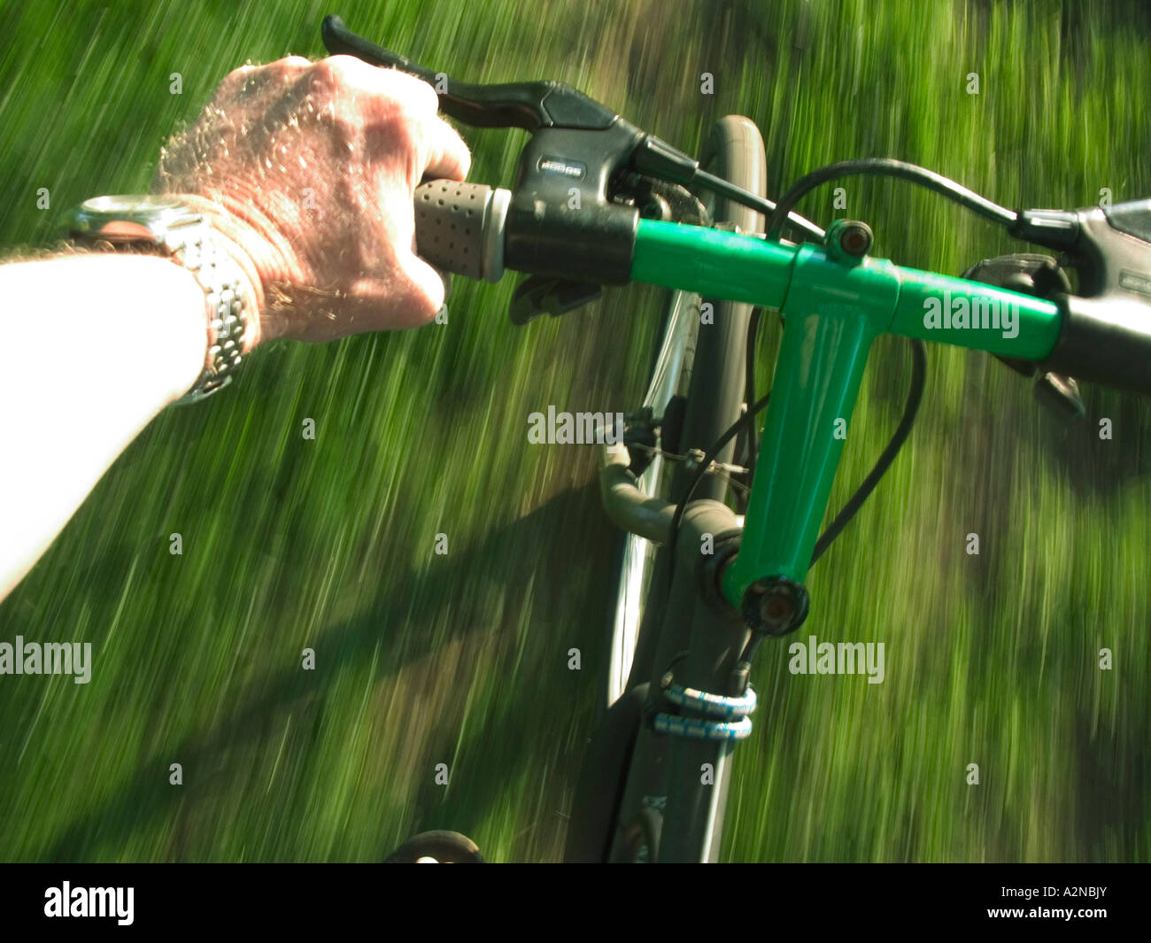 Person riding bicycle Stock Photo - Alamy