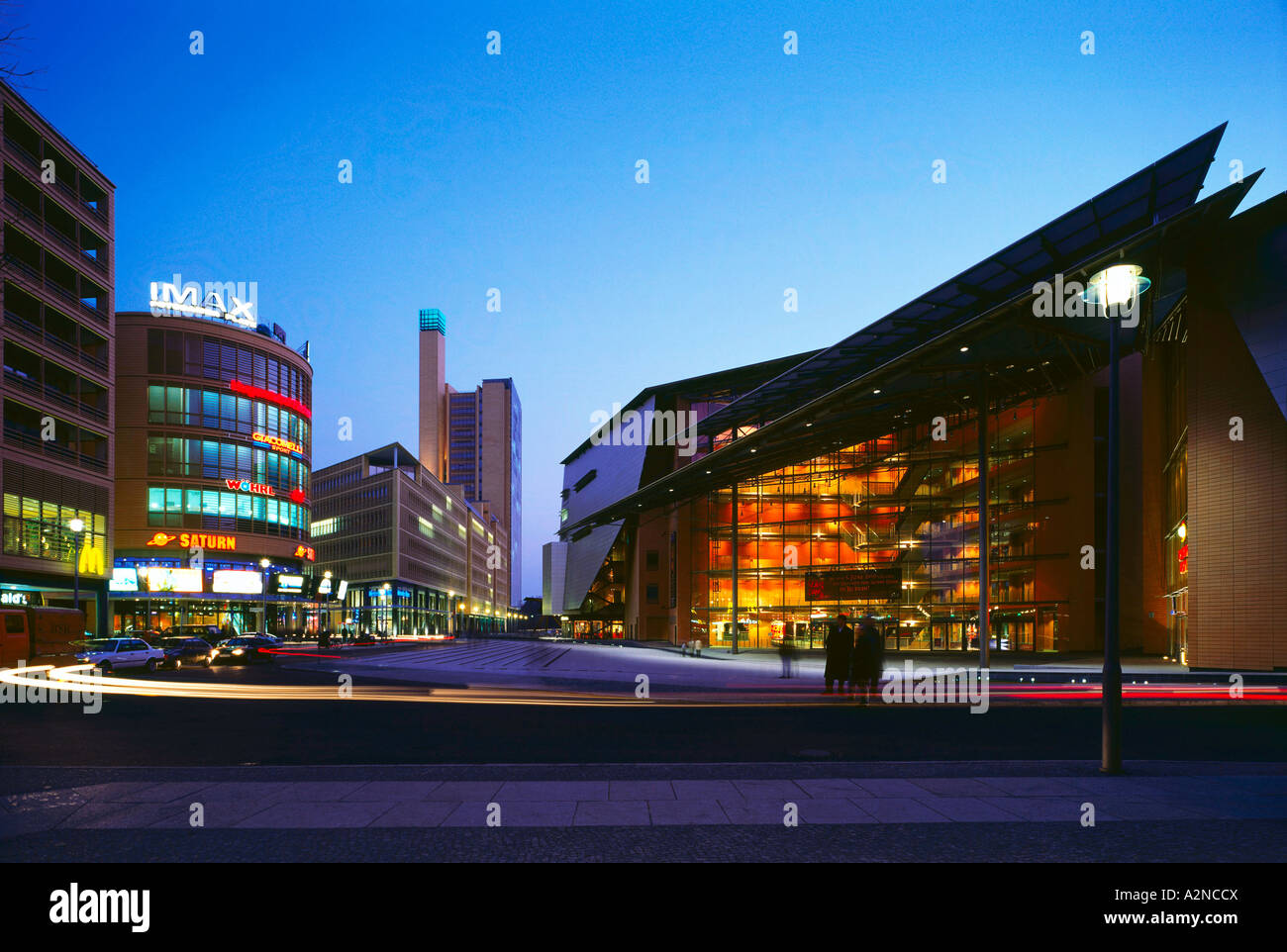 Buildings lit up in city at night, Berlin, Germany Stock Photo - Alamy