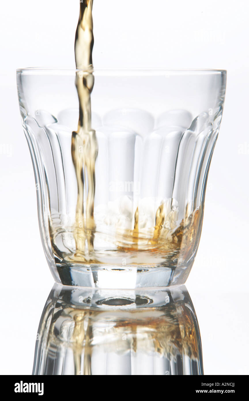 Whiskey poured in glass hi-res stock photography and images - Alamy
