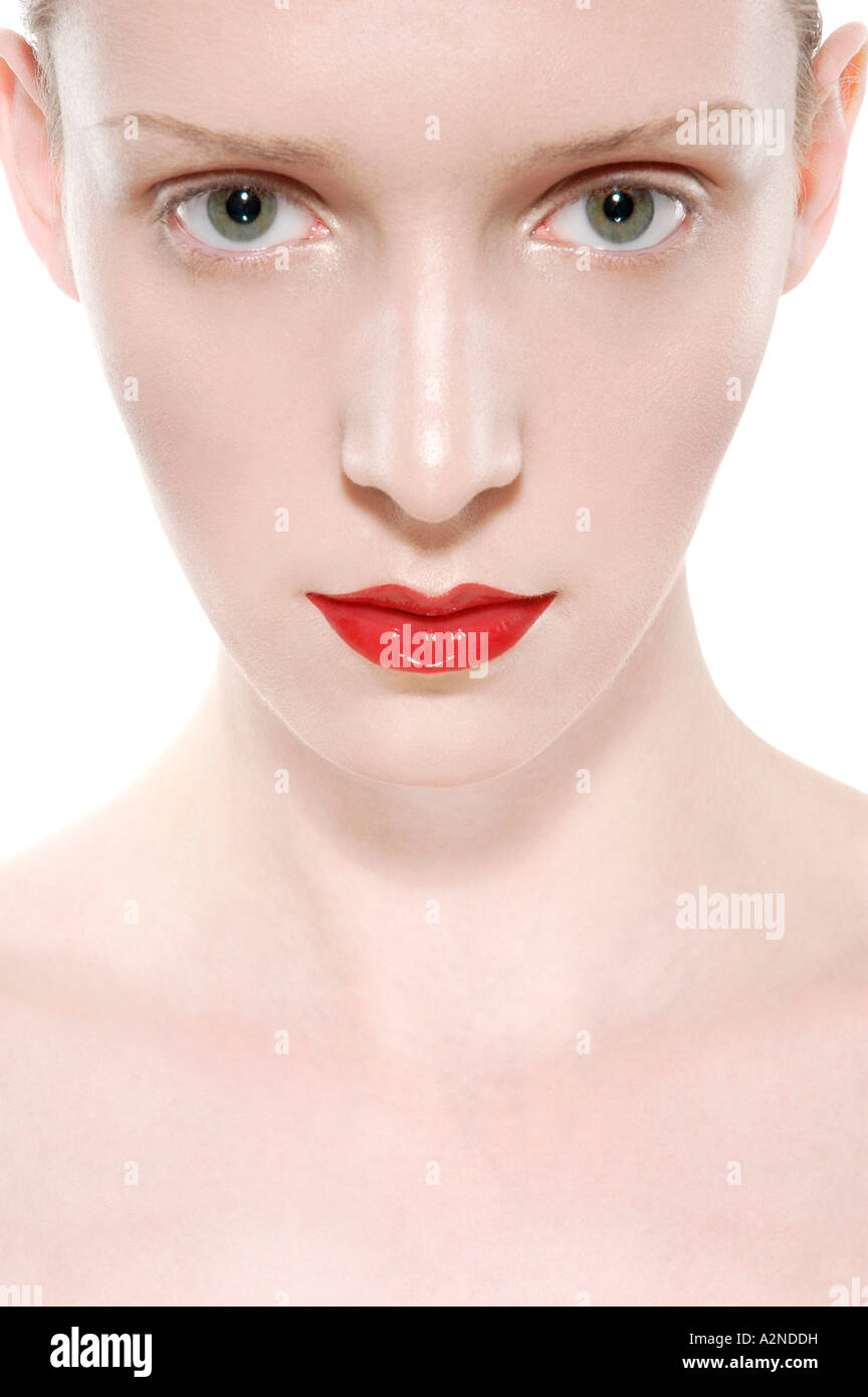 Portrait of young woman looking serious Stock Photo - Alamy